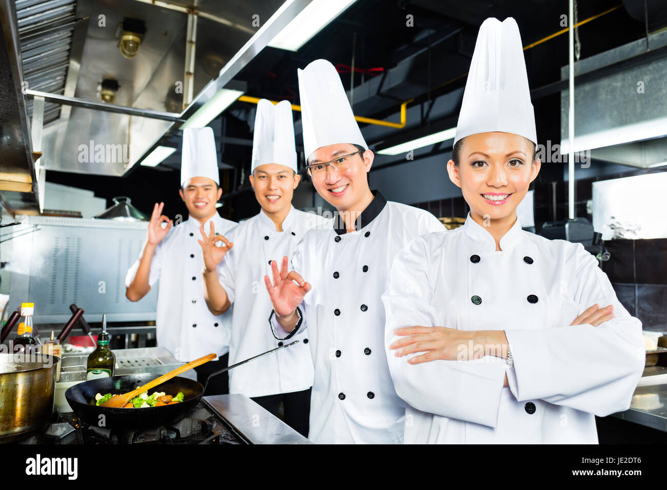 Group of chefs in hotel kitchen hi-res stock photography and images - Alamy