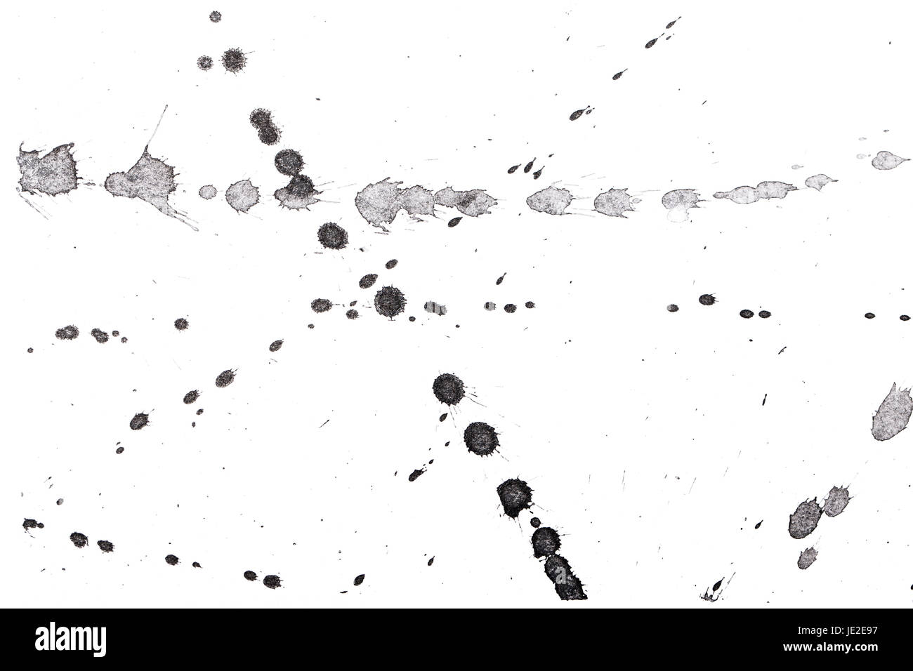 Black ink spatter on white paper hi-res stock photography and images ...