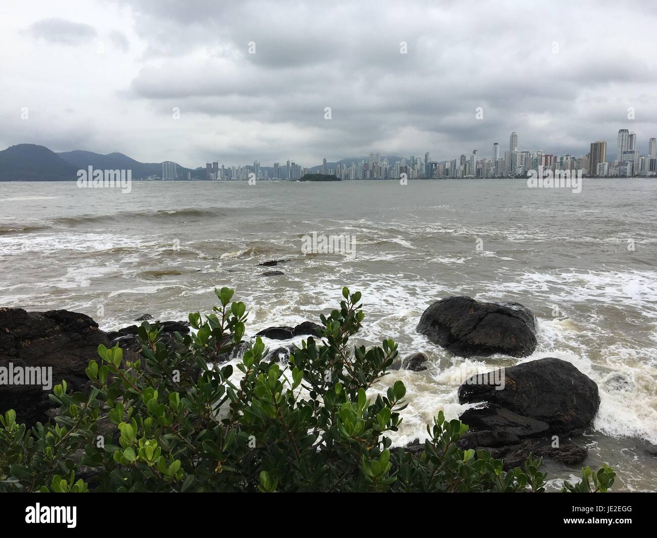 A photo of an amazing beach over the rocks Stock Photo - Alamy