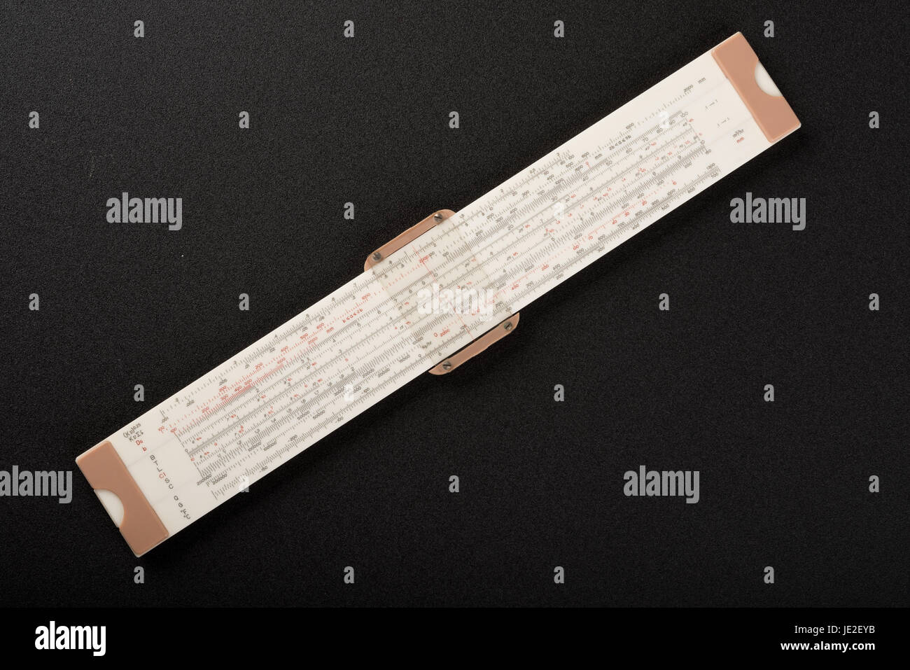professional vanitation pipe ruler on top of black sand paper Stock ...