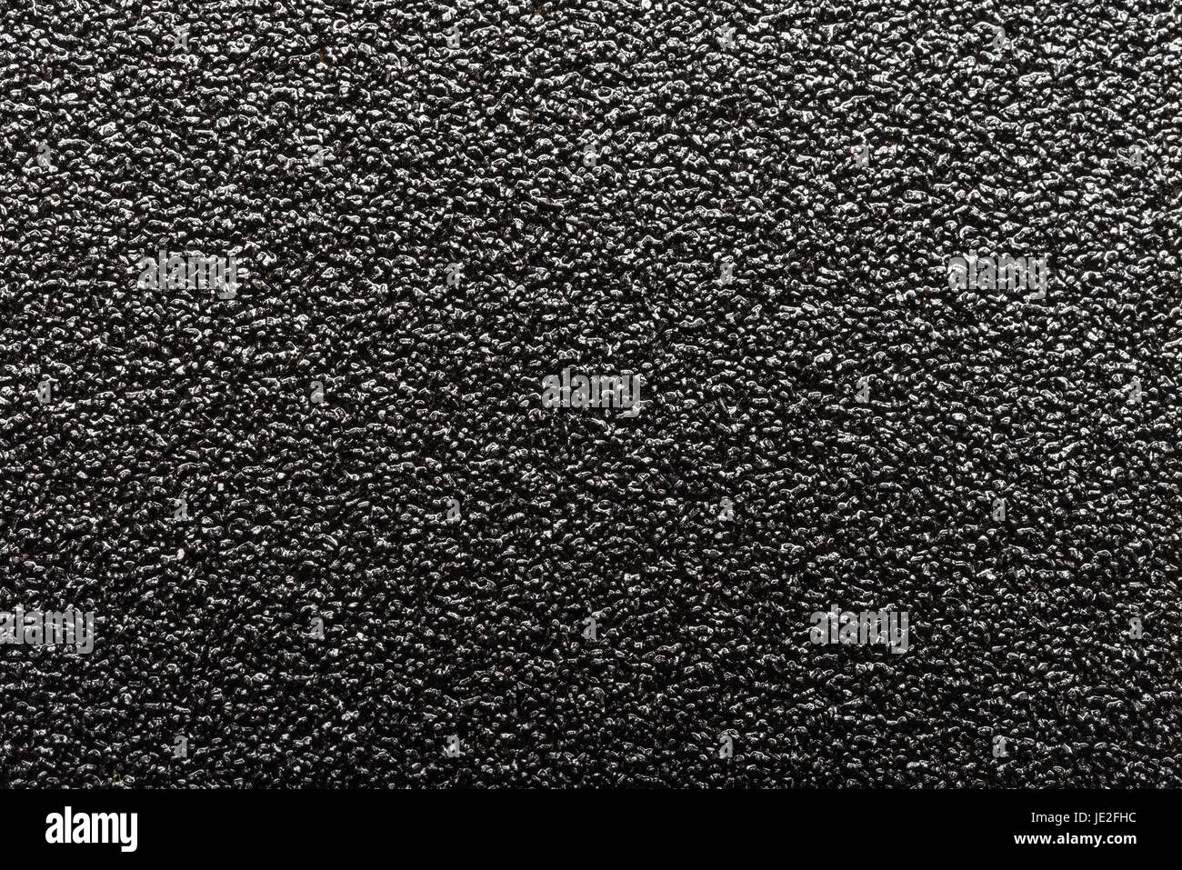 background of rough black sand paper Stock Photo - Alamy
