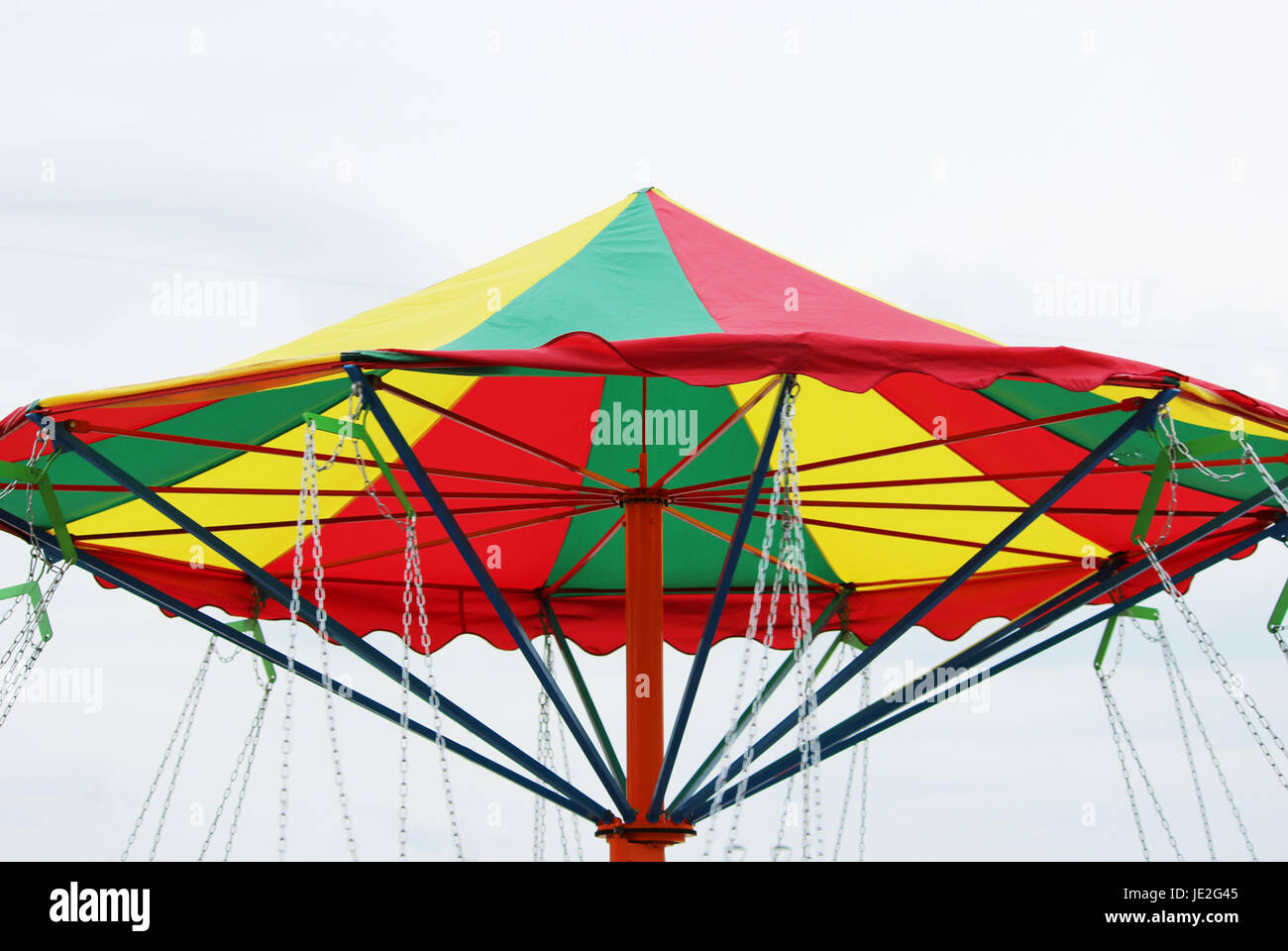 The top of a child's portable carousel against the background of a ...