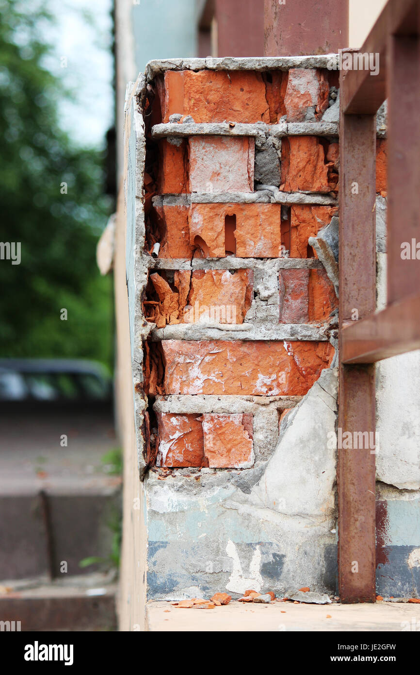 The texture of the old bricks and beige plaster of the house Stock ...