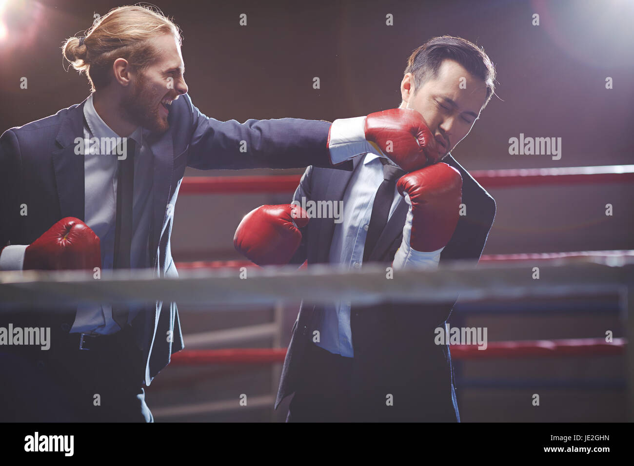 Man in suit wearing boxing hi-res stock photography and images - Alamy