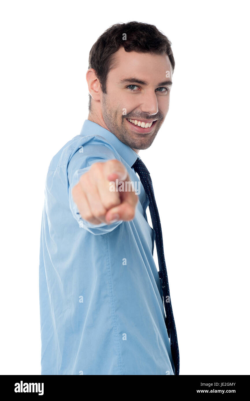 Young businessperson pointing towards camera Stock Photo - Alamy
