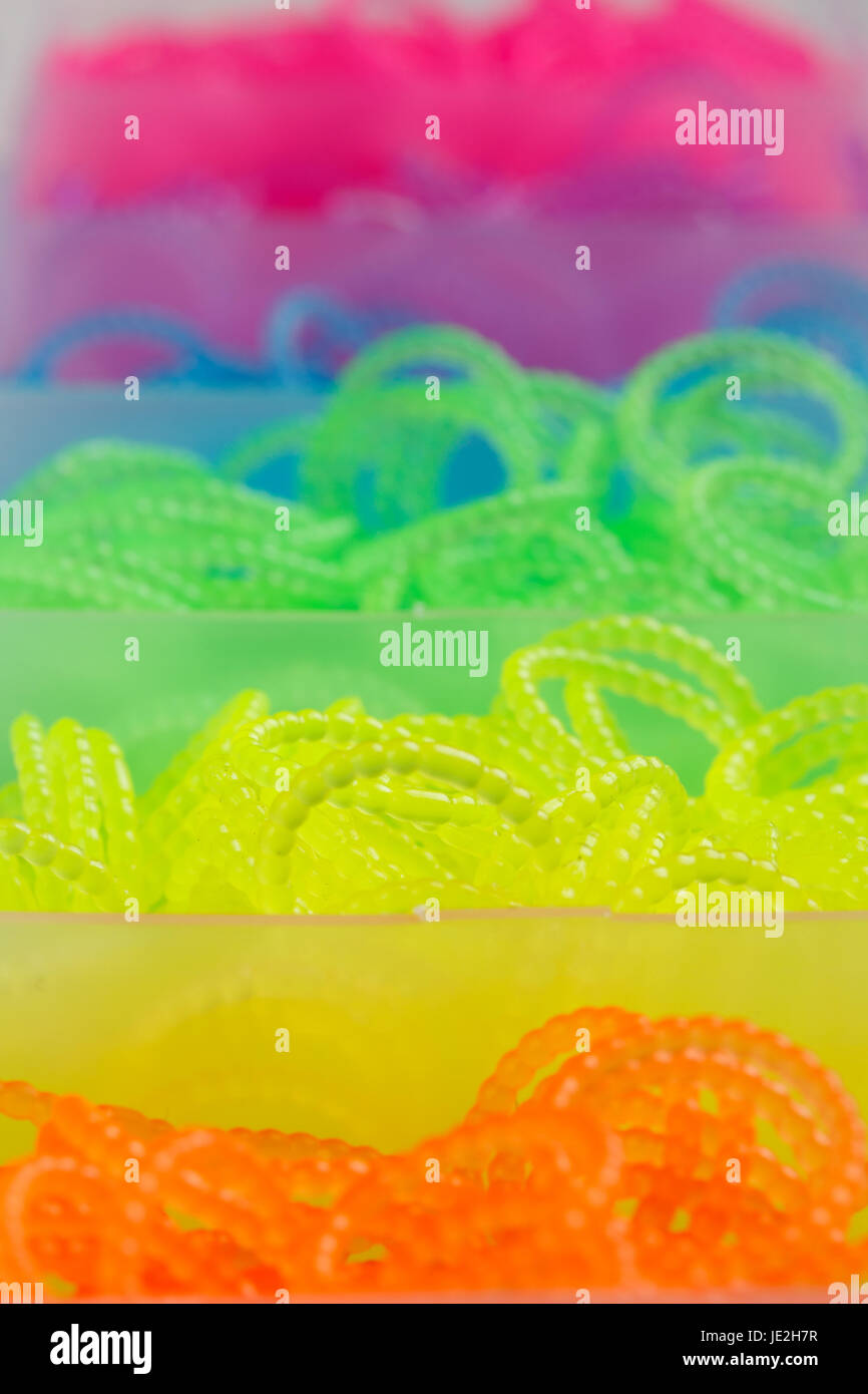 Close up colorful of elastic loom bands in box Stock Photo - Alamy