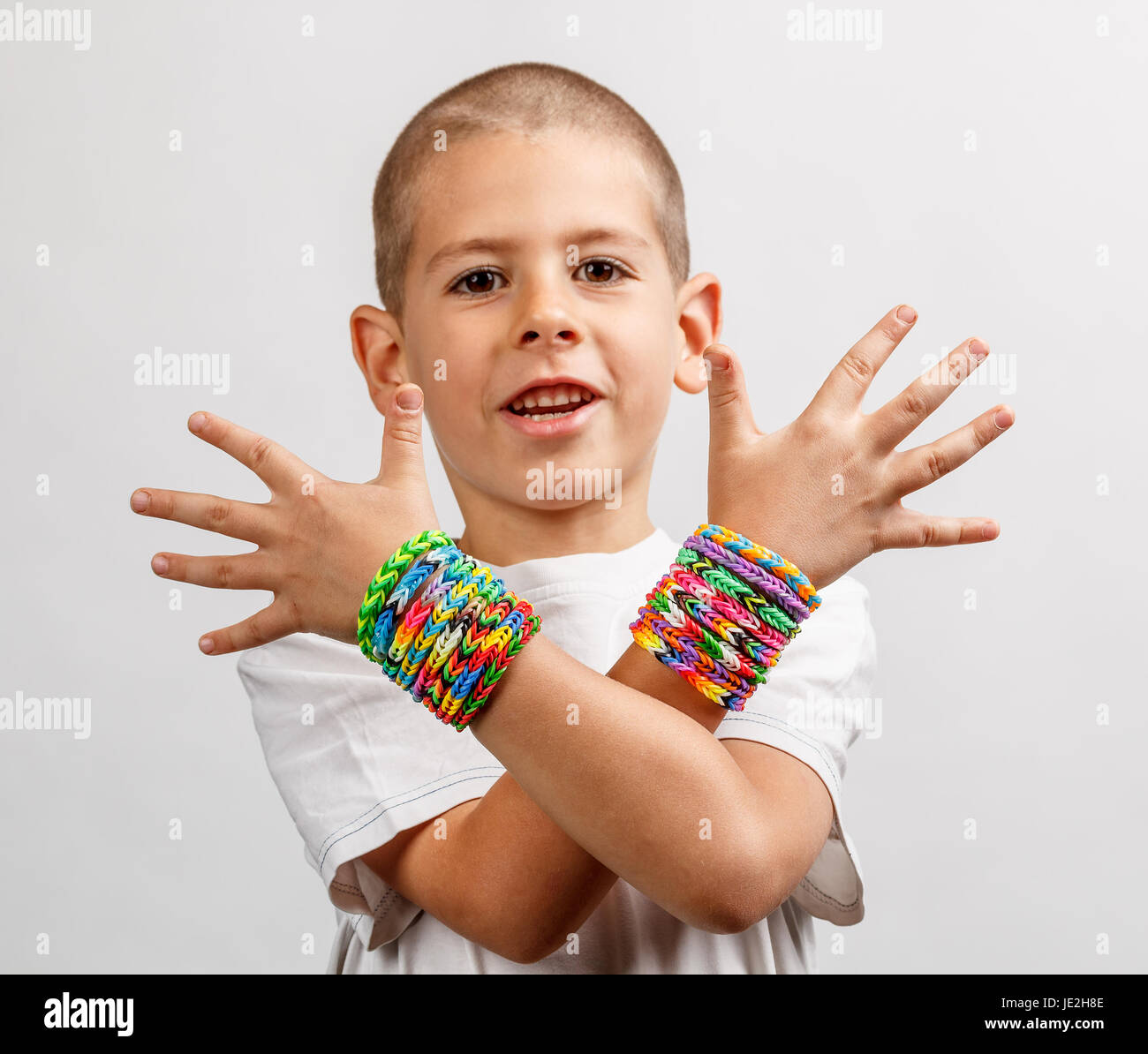Kid wearing loom band bracelets Stock Photo - Alamy