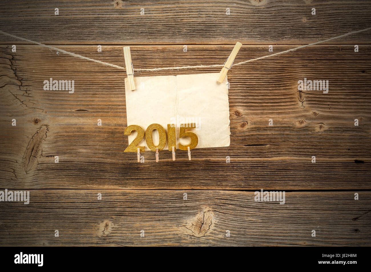 Paper cards hanging on the rope with 2015 golden figures Stock Photo ...
