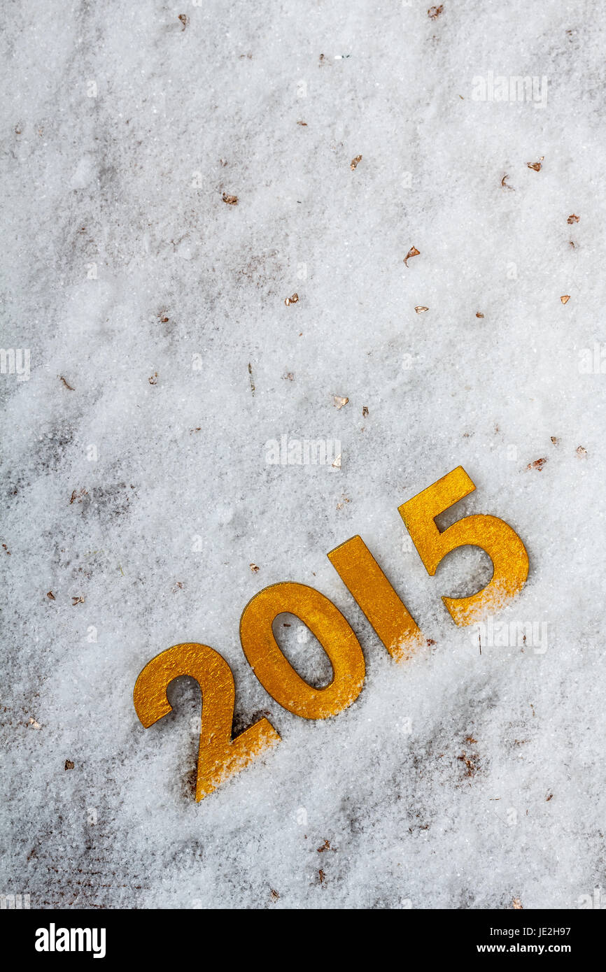 2015 year golden figures on snow background Stock Photo - Alamy