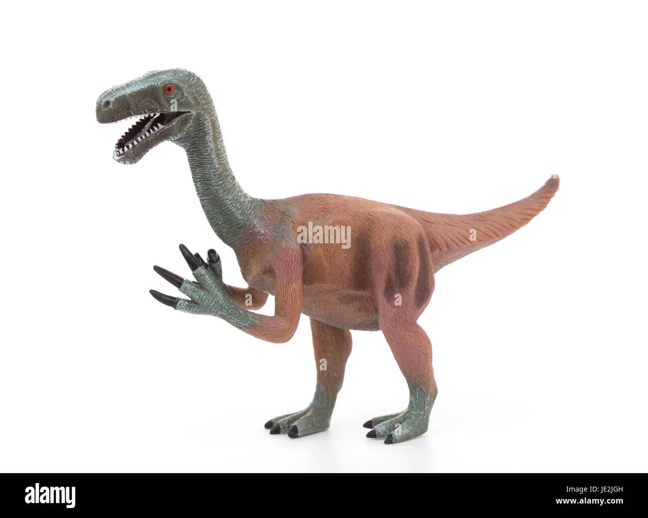 side view nothronychus toy on a white background Stock Photo - Alamy