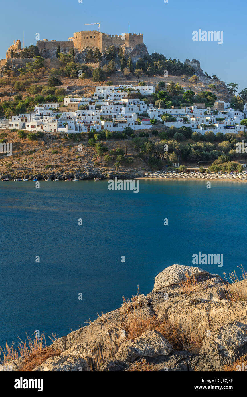 Lindos with the castle above on the Greek Island of Rhodes Stock Photo ...