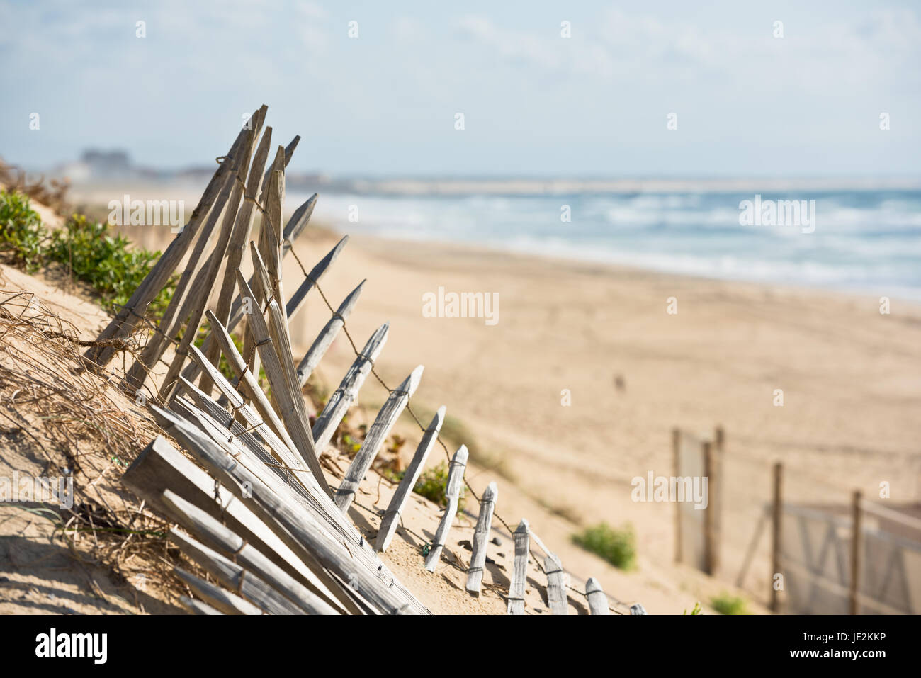 Wooden fence on an Atlantic beach in France, The Gironde Department ...