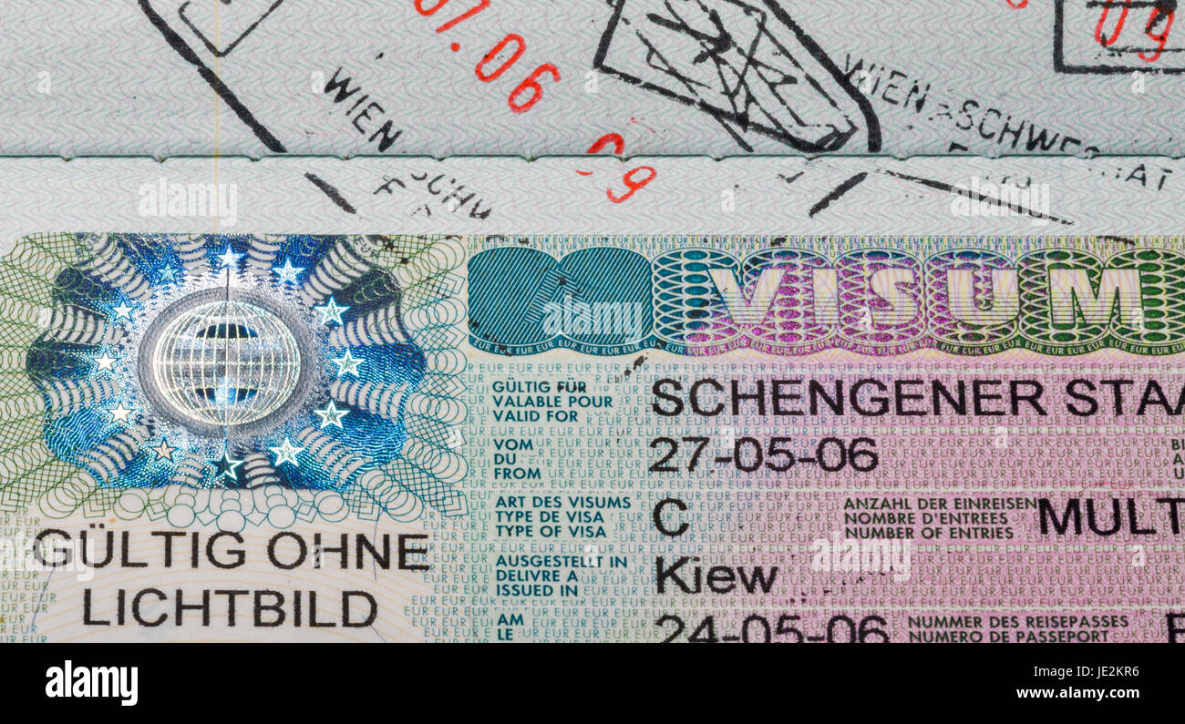 Schengen visa in passport closeup macro, Austria Schengen. With sign ...