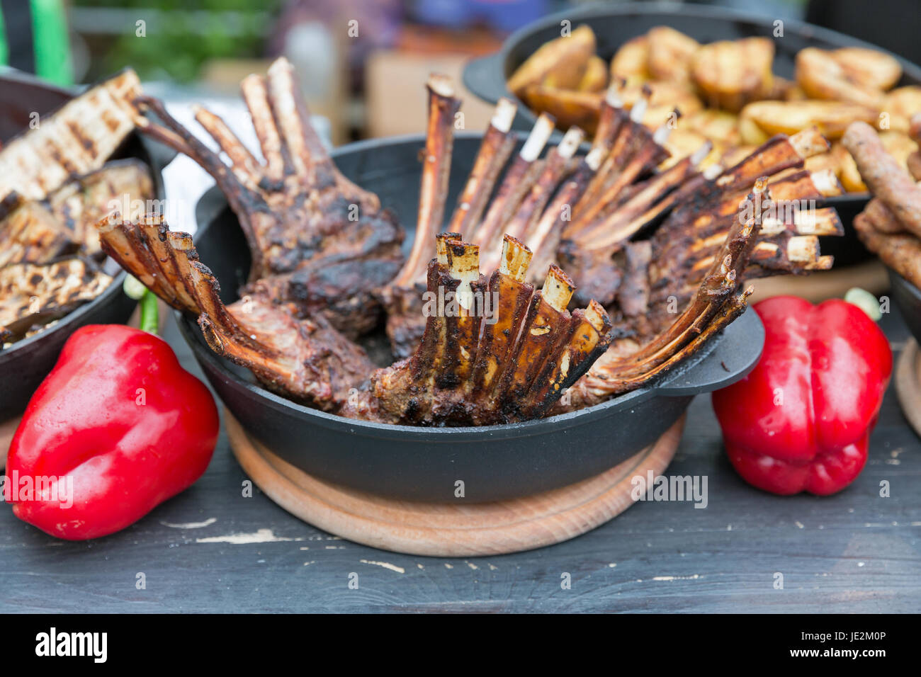 Roasted lamb rib chops with vegetables closeup, street food Stock Photo ...