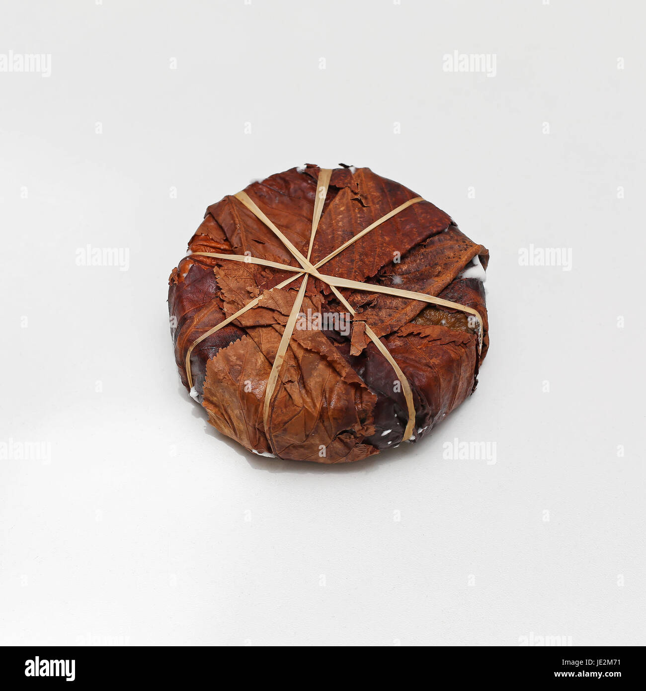 Goat cheese in chestnut leaves French cuisine Stock Photo - Alamy