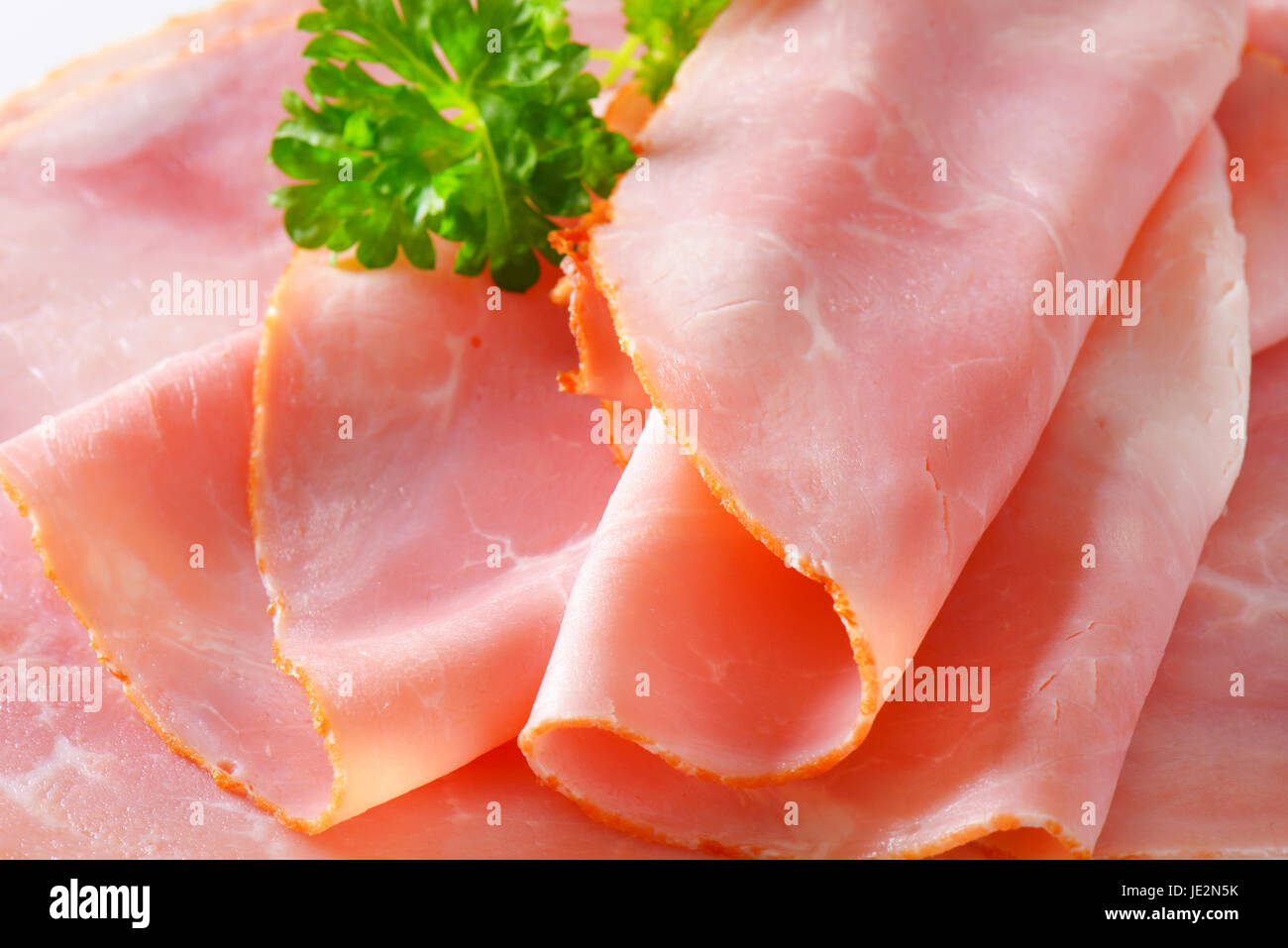 Thin slices of baked ham Stock Photo - Alamy