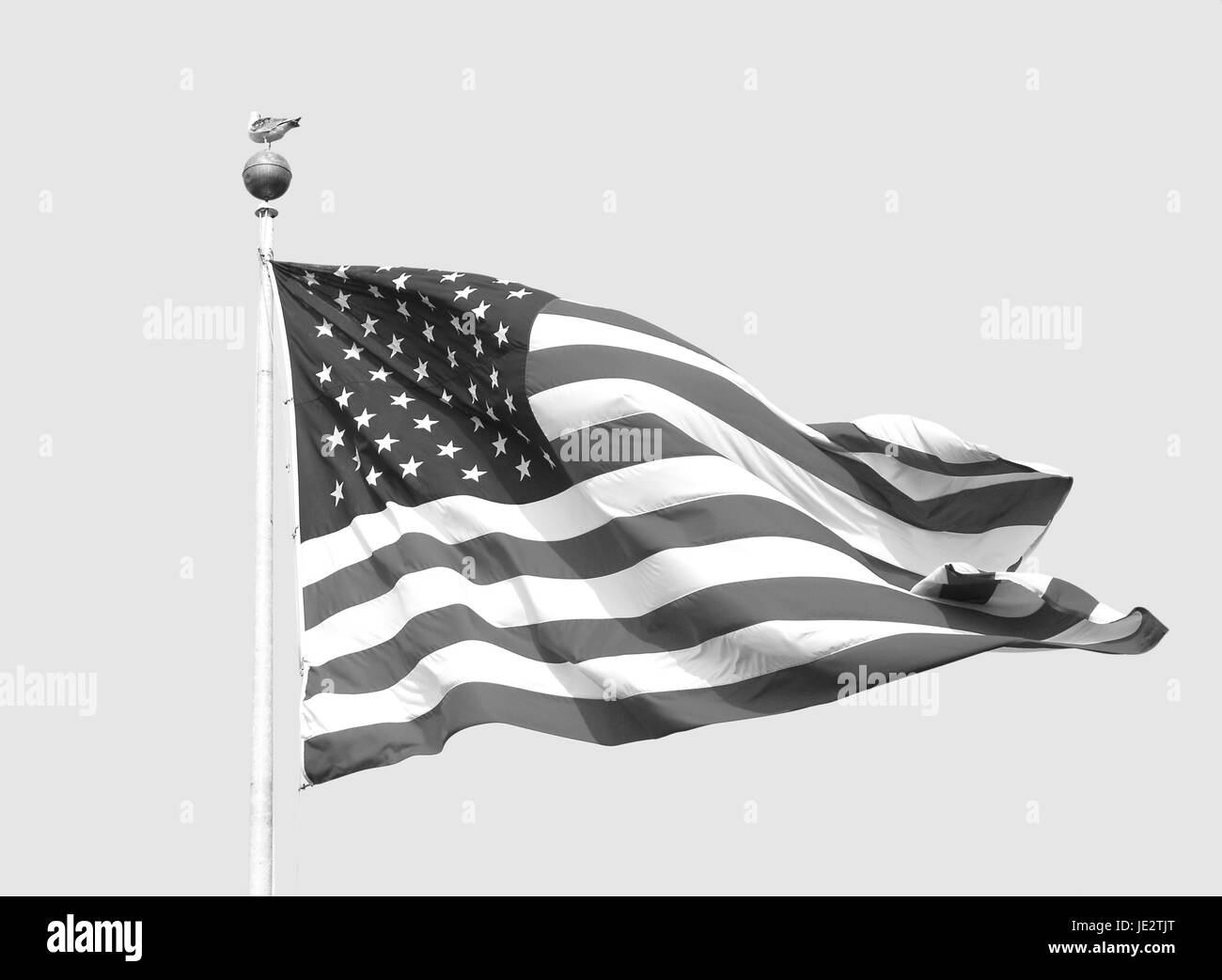 The American flag - the Stars and Stripes - flies on a sunny day ...