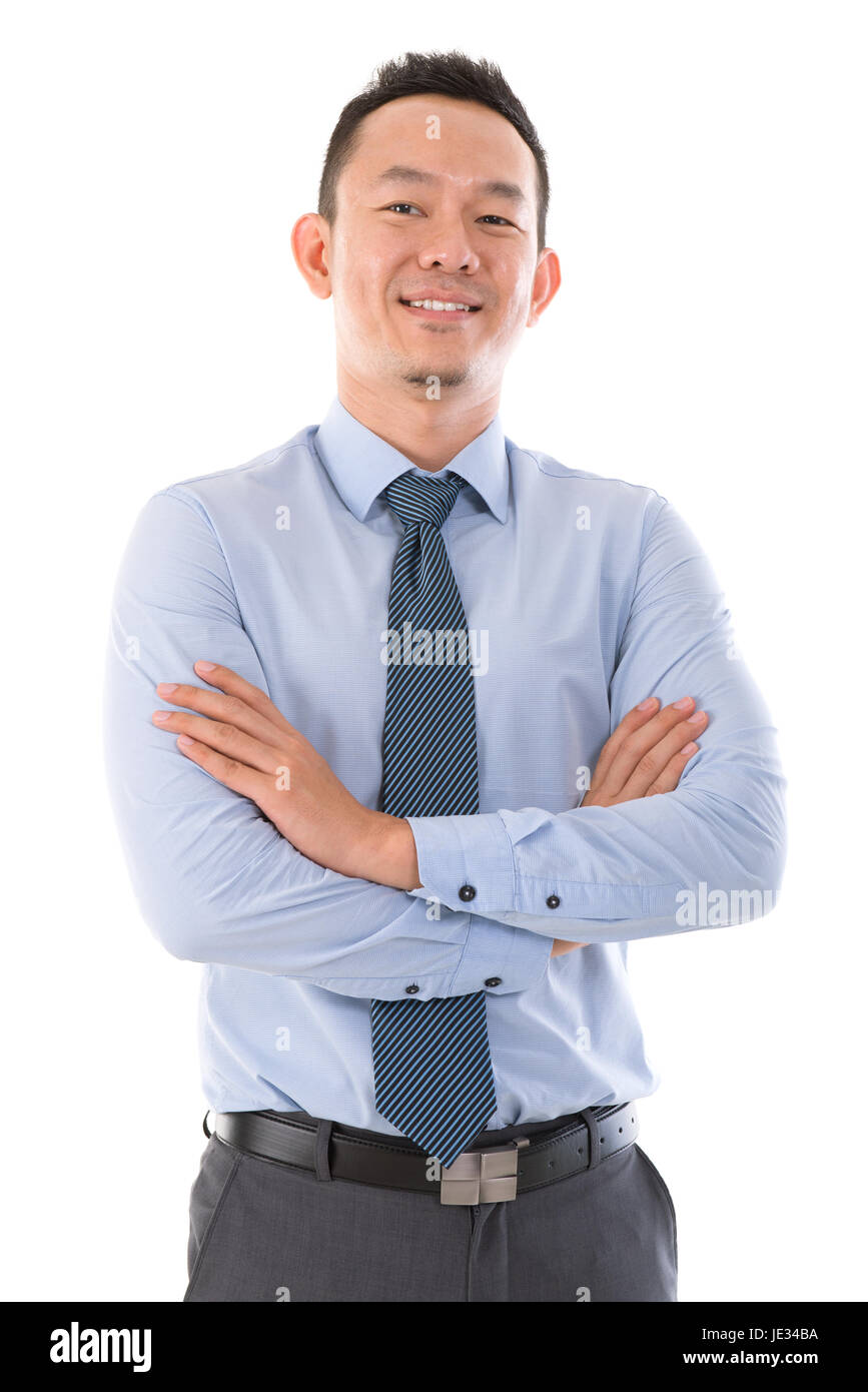 Confident Asian business man smiling, standing isolated over white ...