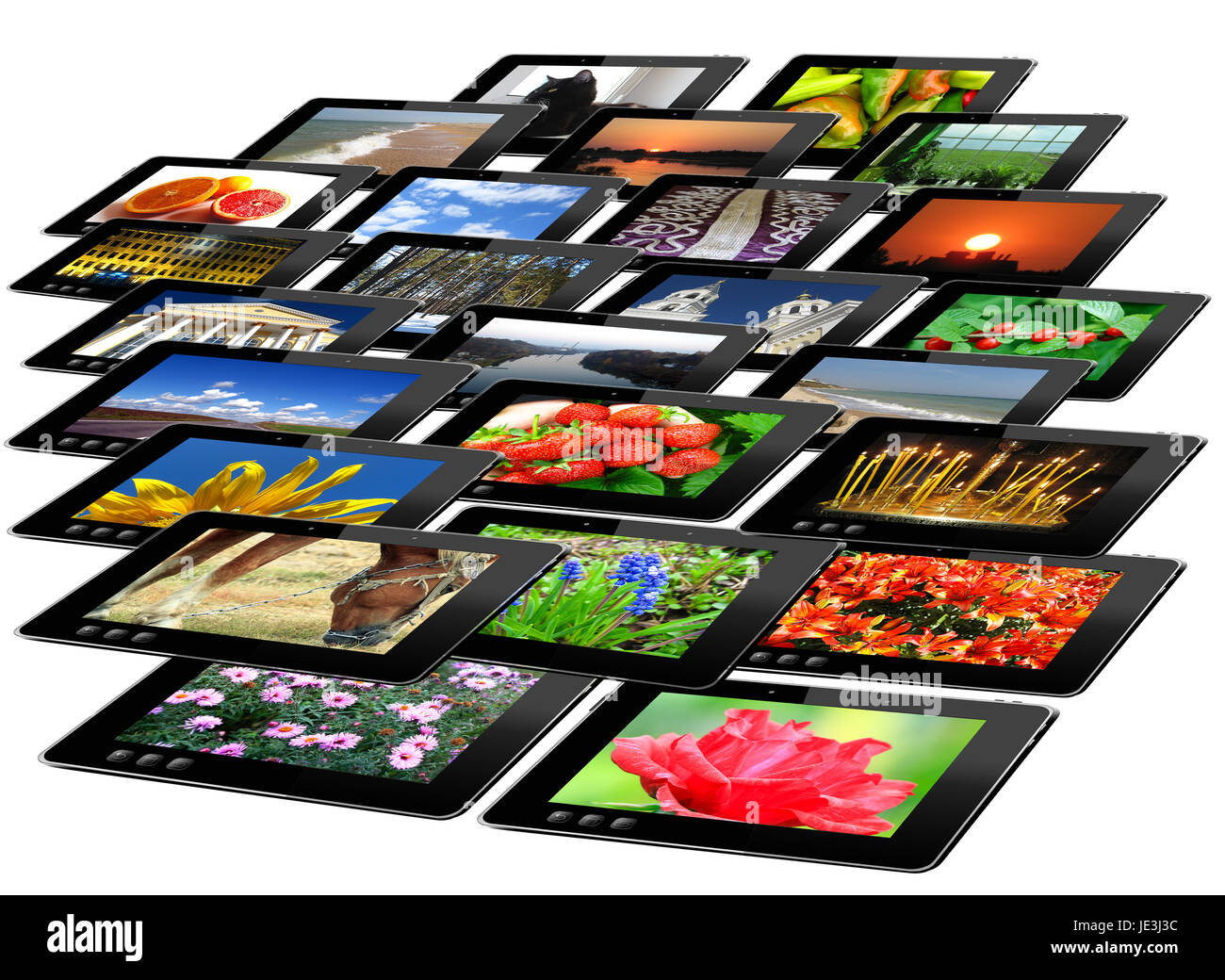 tablets with motley pictures isolated on the white background Stock ...