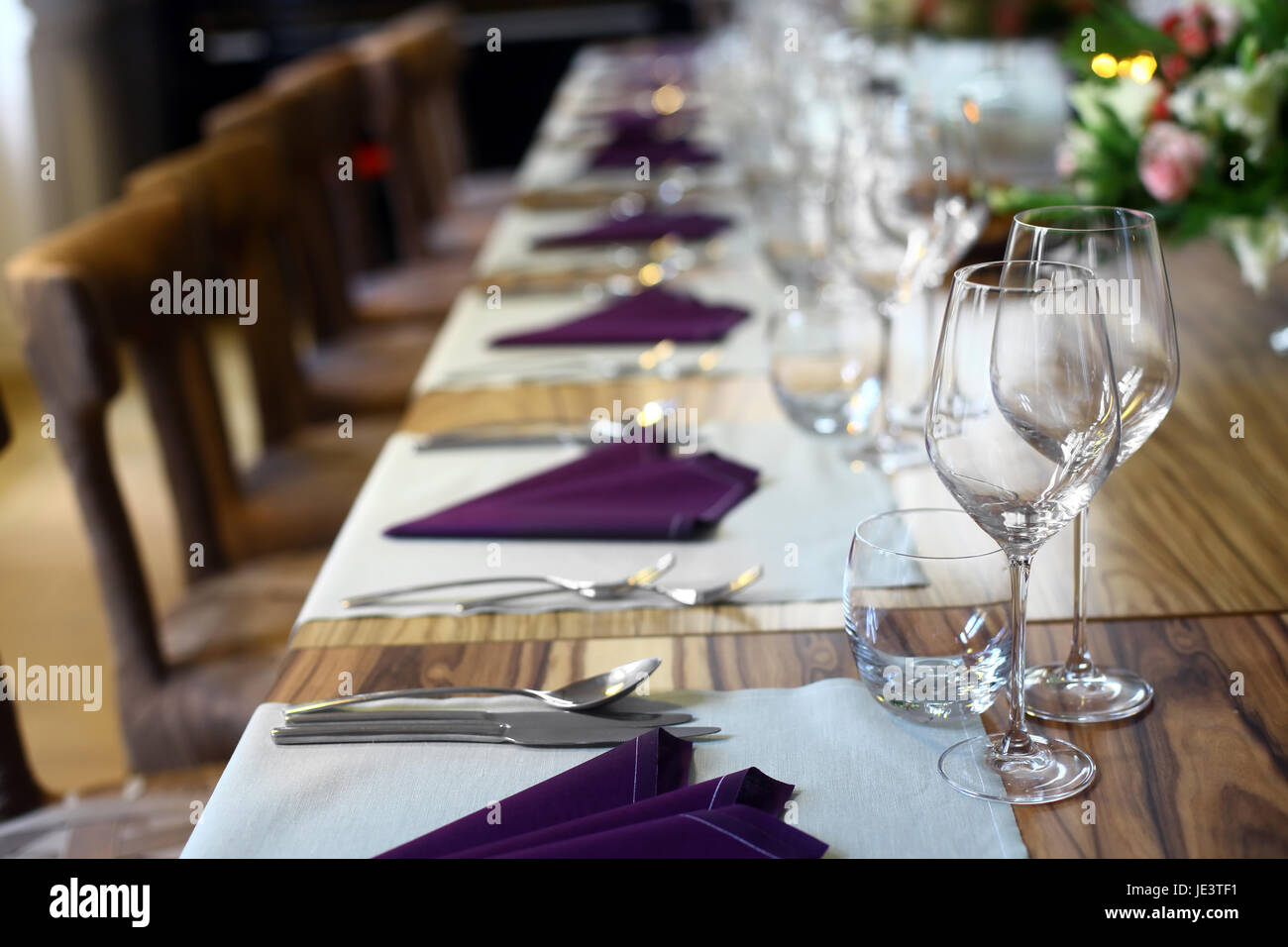 Shot with a dinner table in a restaurant Stock Photo - Alamy