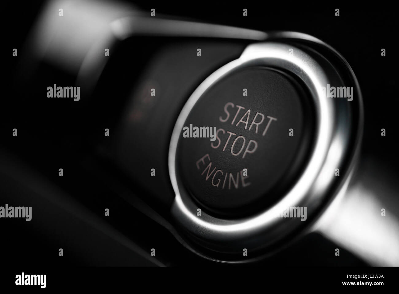 Detail on a black start button in a car Stock Photo - Alamy