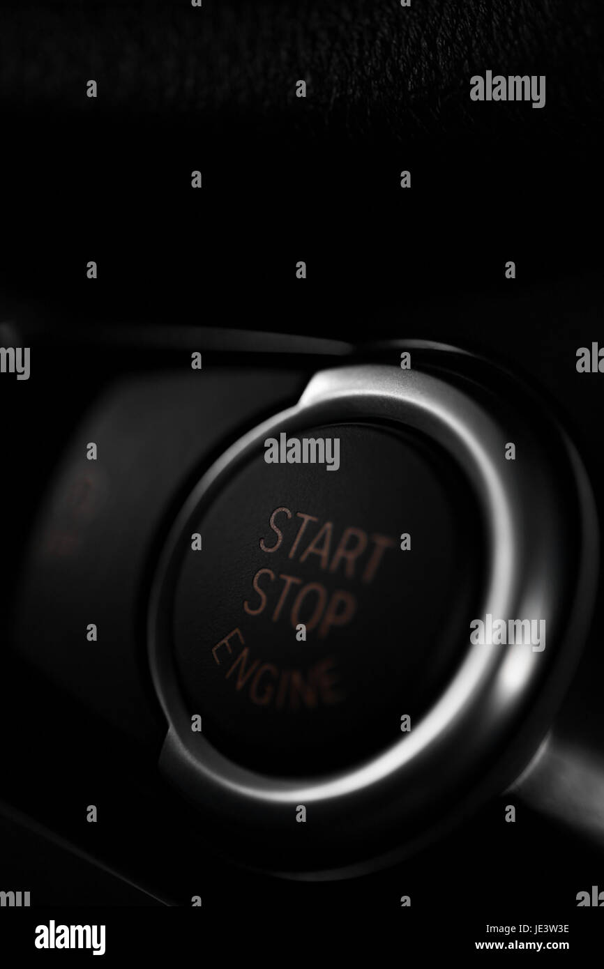 Detail on a black start button in a car Stock Photo - Alamy