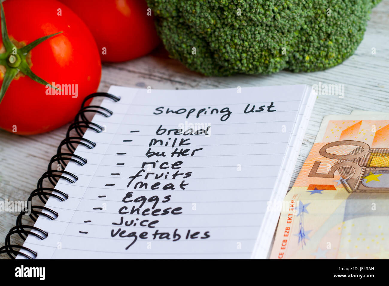 Preparing the shopping list before going to buy the groceries Stock ...