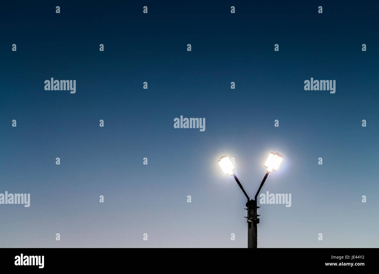LED street spotlight against the clear evening sky Stock Photo - Alamy