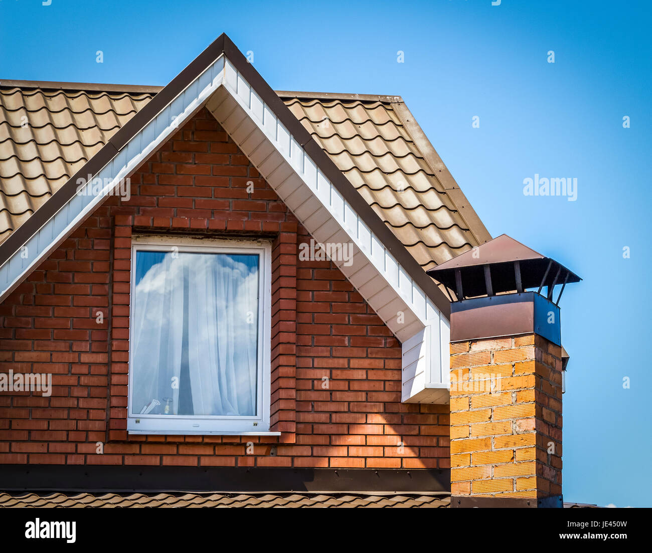 The upper part of the house. Roof, inspection windows, chimney Stock ...