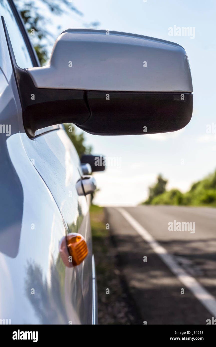 Passenger car close-up stands on the side of the road Stock Photo - Alamy