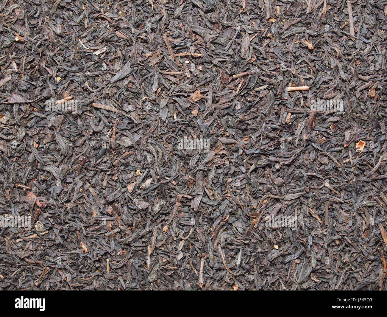 Loose tea leaves useful as a background Stock Photo - Alamy