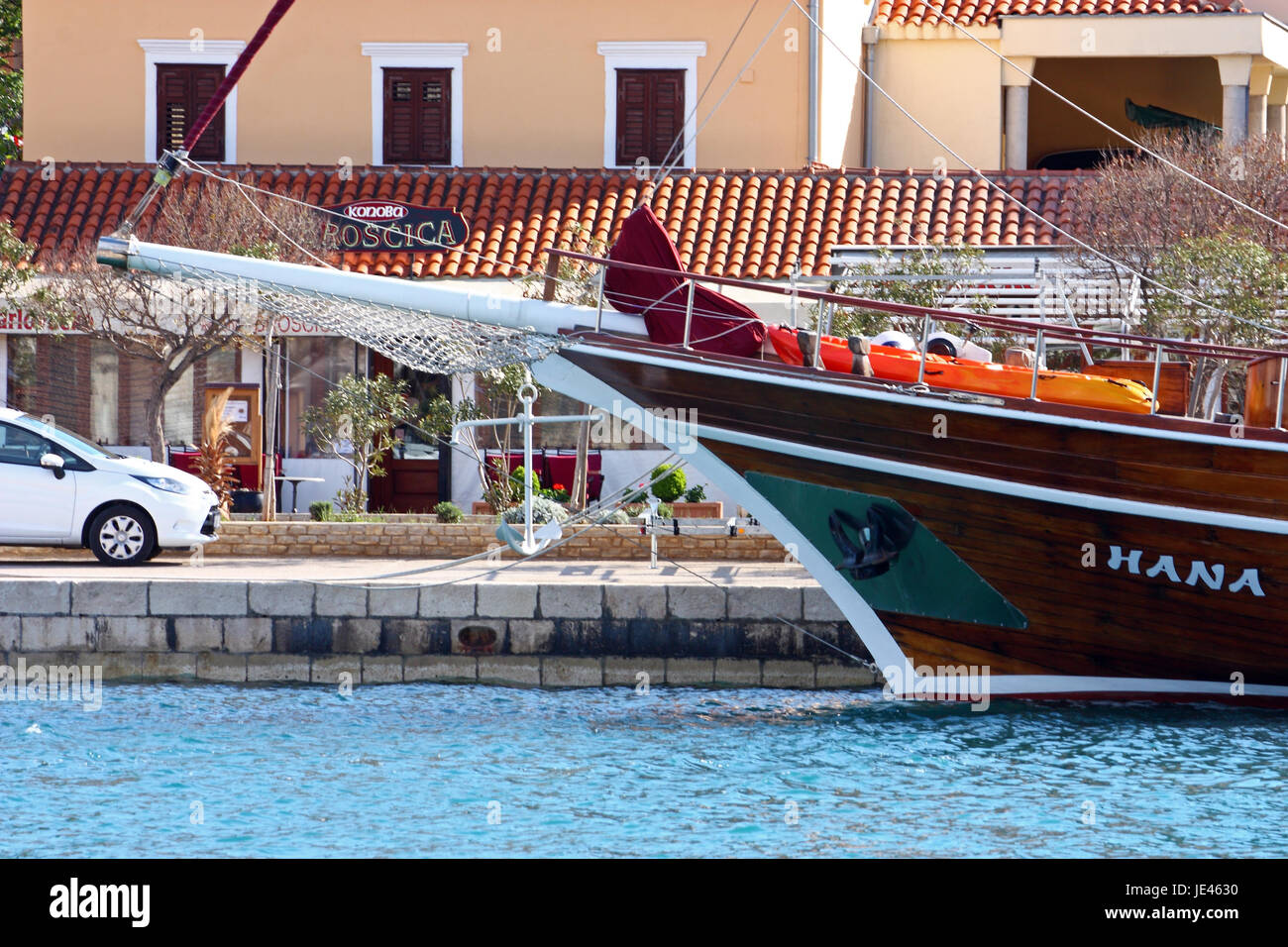 CROATIA TISNO, 9 APRIL 2012: The bow of a ship anchored in the town of ...