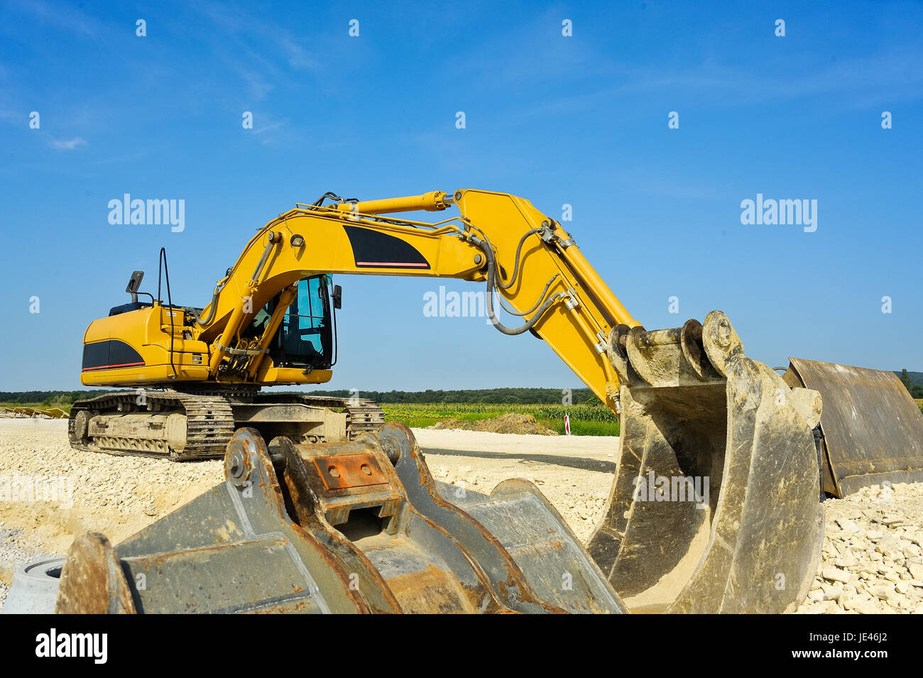 excavator on construction site Stock Photo - Alamy
