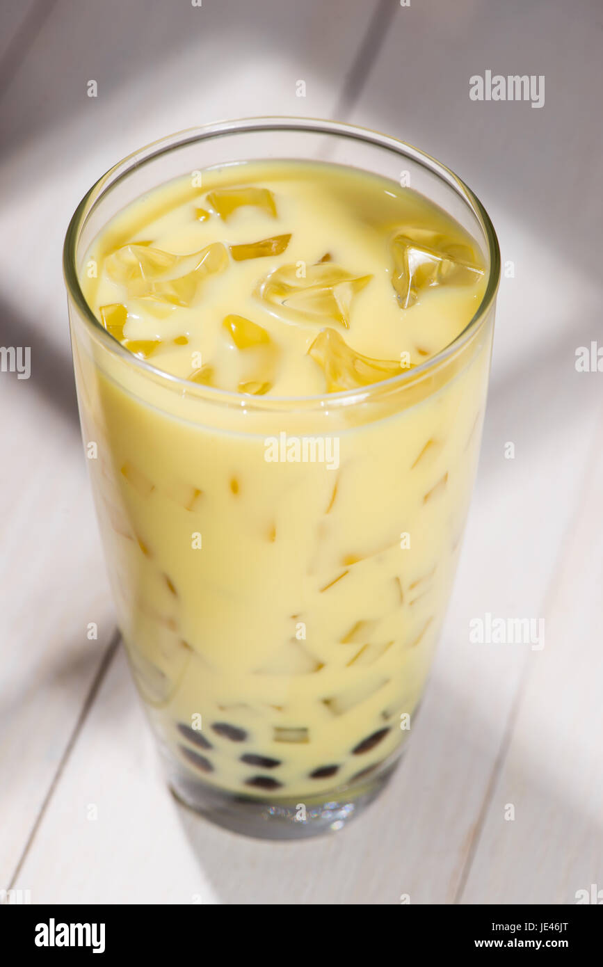 Boba / Bubble tea. Homemade Milk Tea with Pearls on wooden table Stock ...