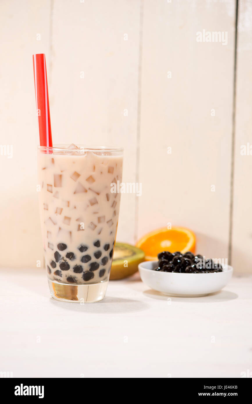 Boba / Bubble tea. Homemade Milk Tea with Pearls on wooden table Stock ...