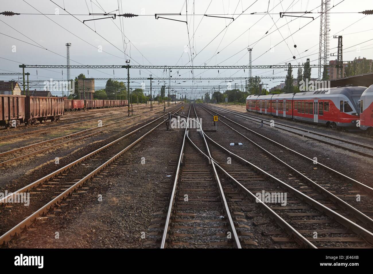 Many railway tracks at a station Stock Photo - Alamy