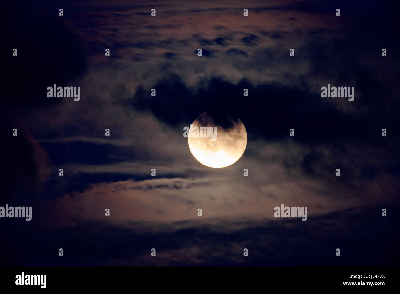 Nice night shot of the full moon with clouds Stock Photo - Alamy