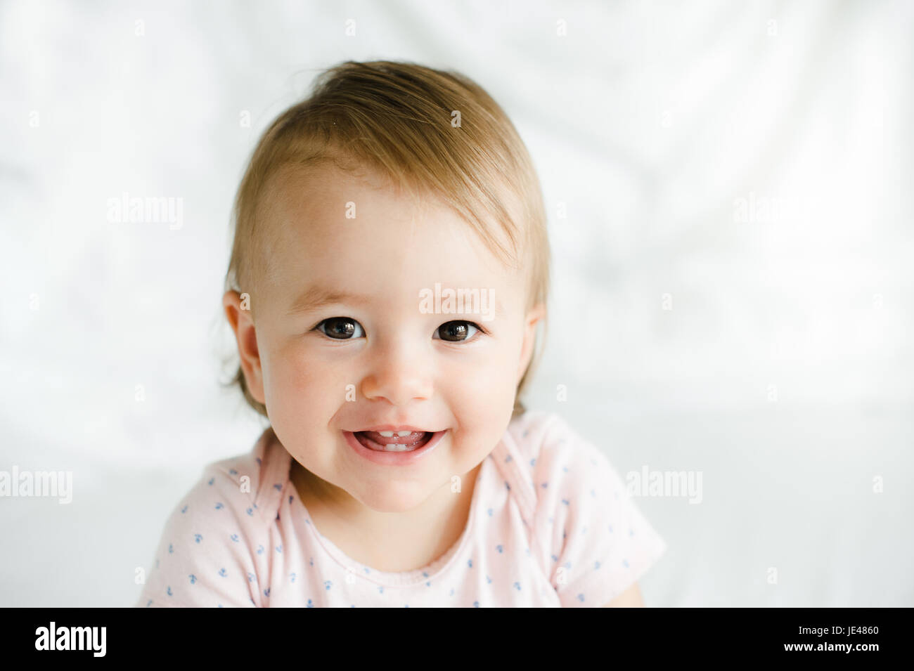 Friendly one year old baby smiling Stock Photo - Alamy