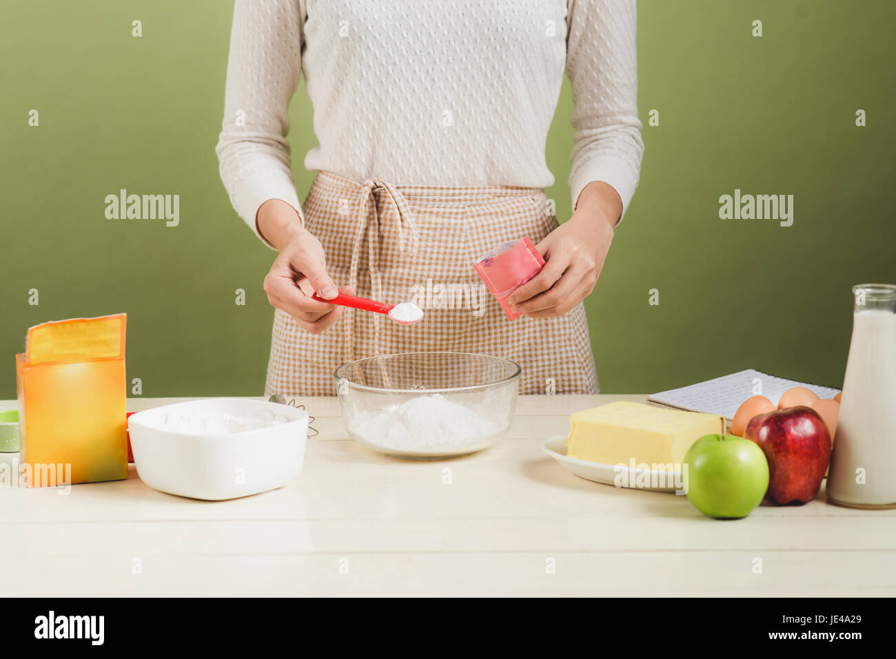 House wife wearing apron making. Steps of making cooking pancake Stock ...