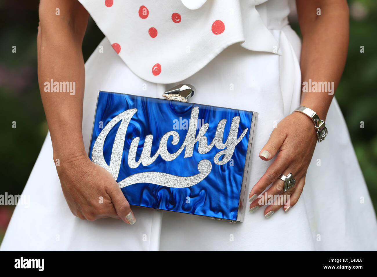 Sharon Teague from Derbyshire holds her 'lucky' clutchbag during day ...