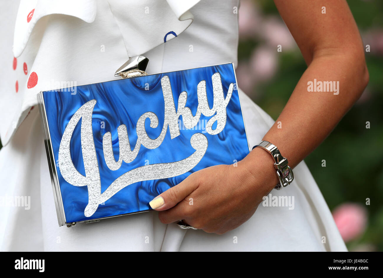 Sharon Teague from Derbyshire holds her 'lucky' clutchbag during day ...