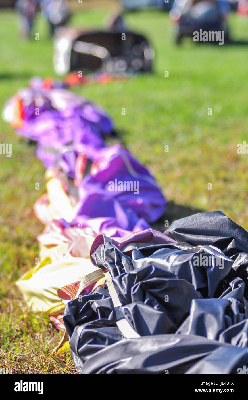 hot air balloon ready for assembly on a field Stock Photo - Alamy