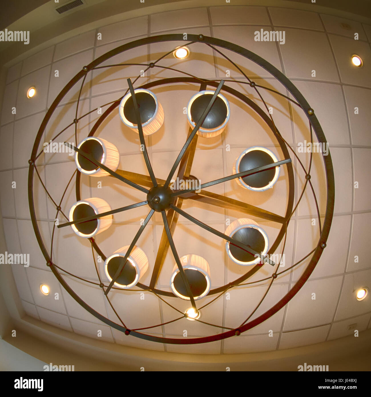 looking up at large modern chandelier Stock Photo - Alamy