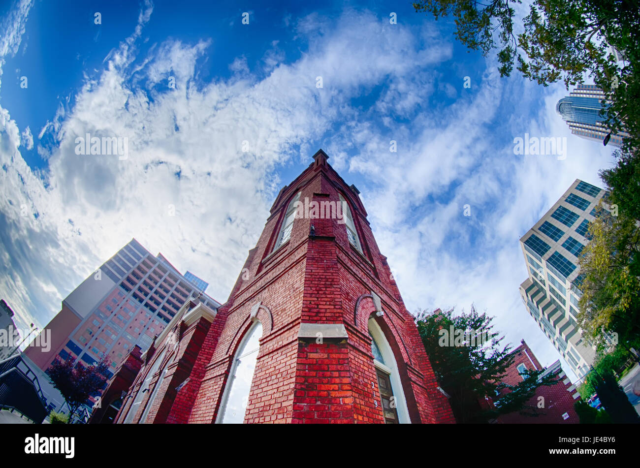 old brick church abuilding in a city Stock Photo - Alamy