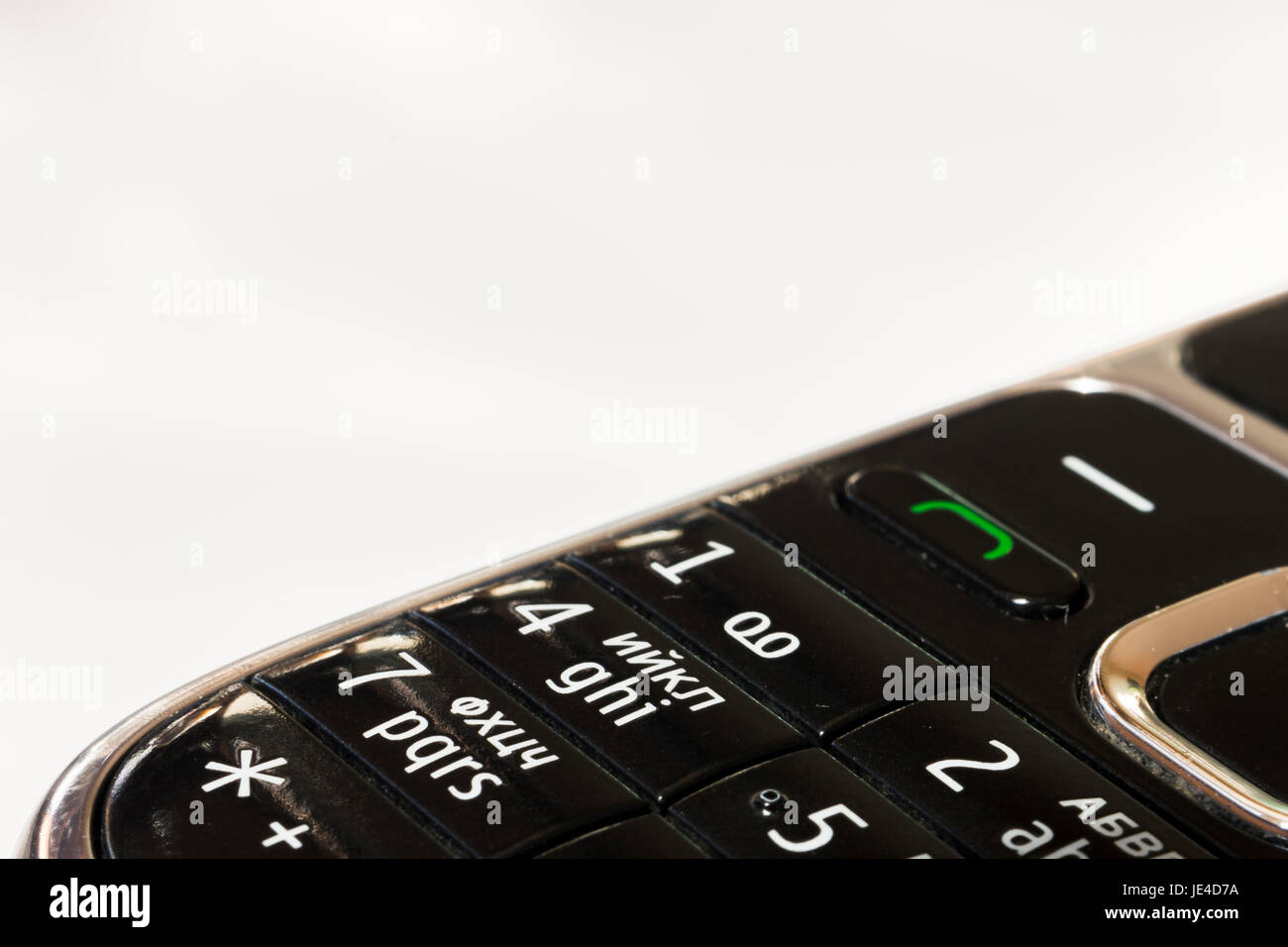 Close- up of mobile phone keypad isolated on white Stock Photo - Alamy