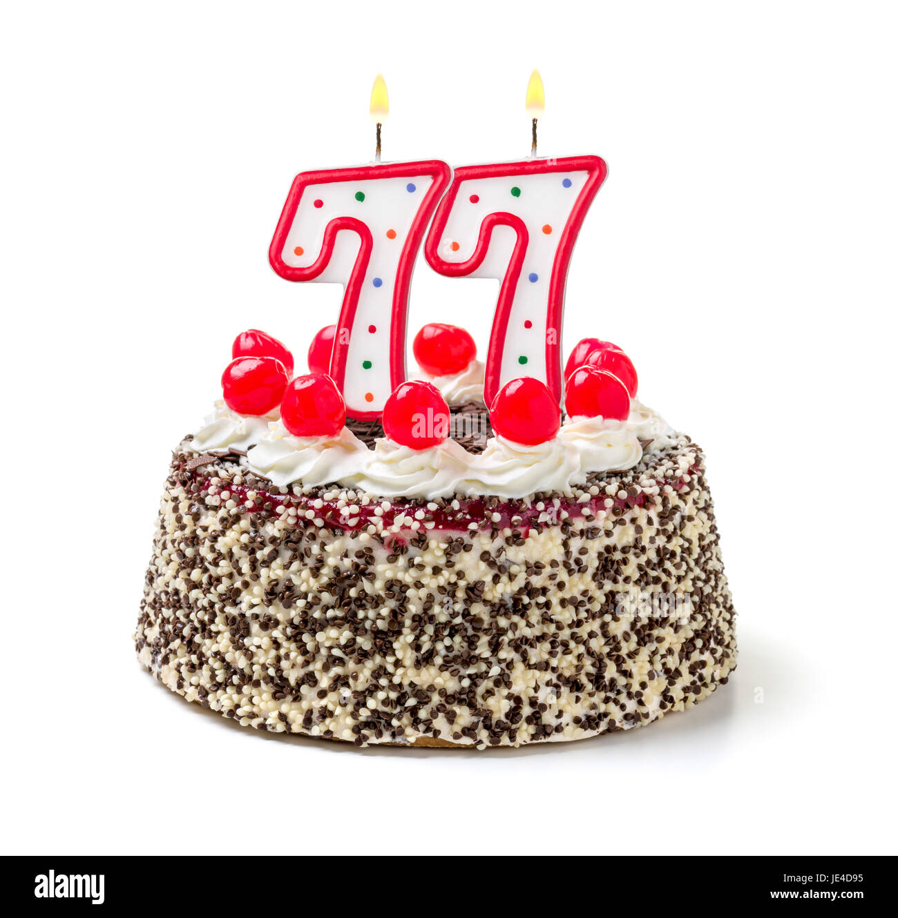 Geburtstagstorte mit brennender Kerze Nummer 77 Stock Photo - Alamy