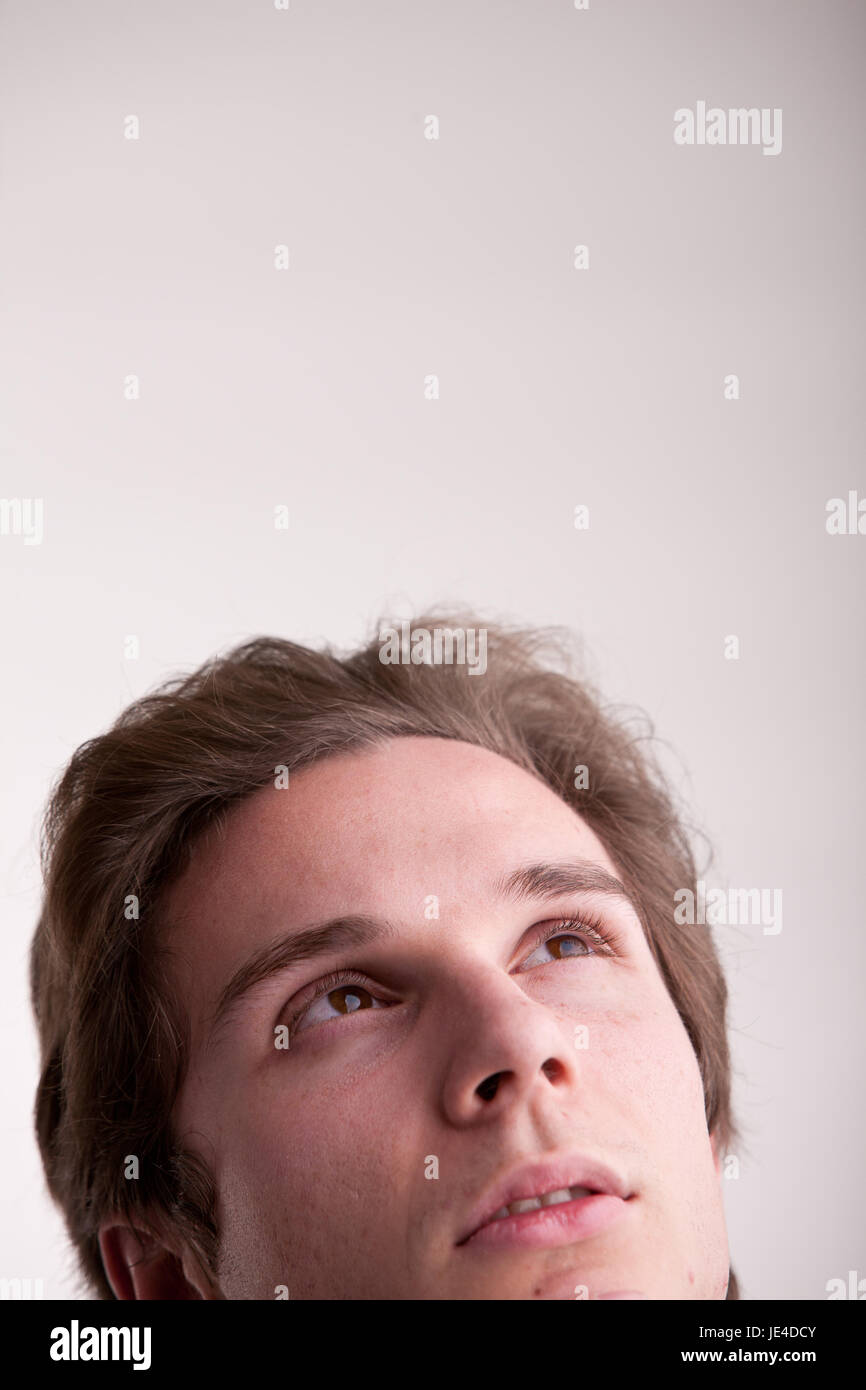 young man thinking about the future or a great idea Stock Photo - Alamy