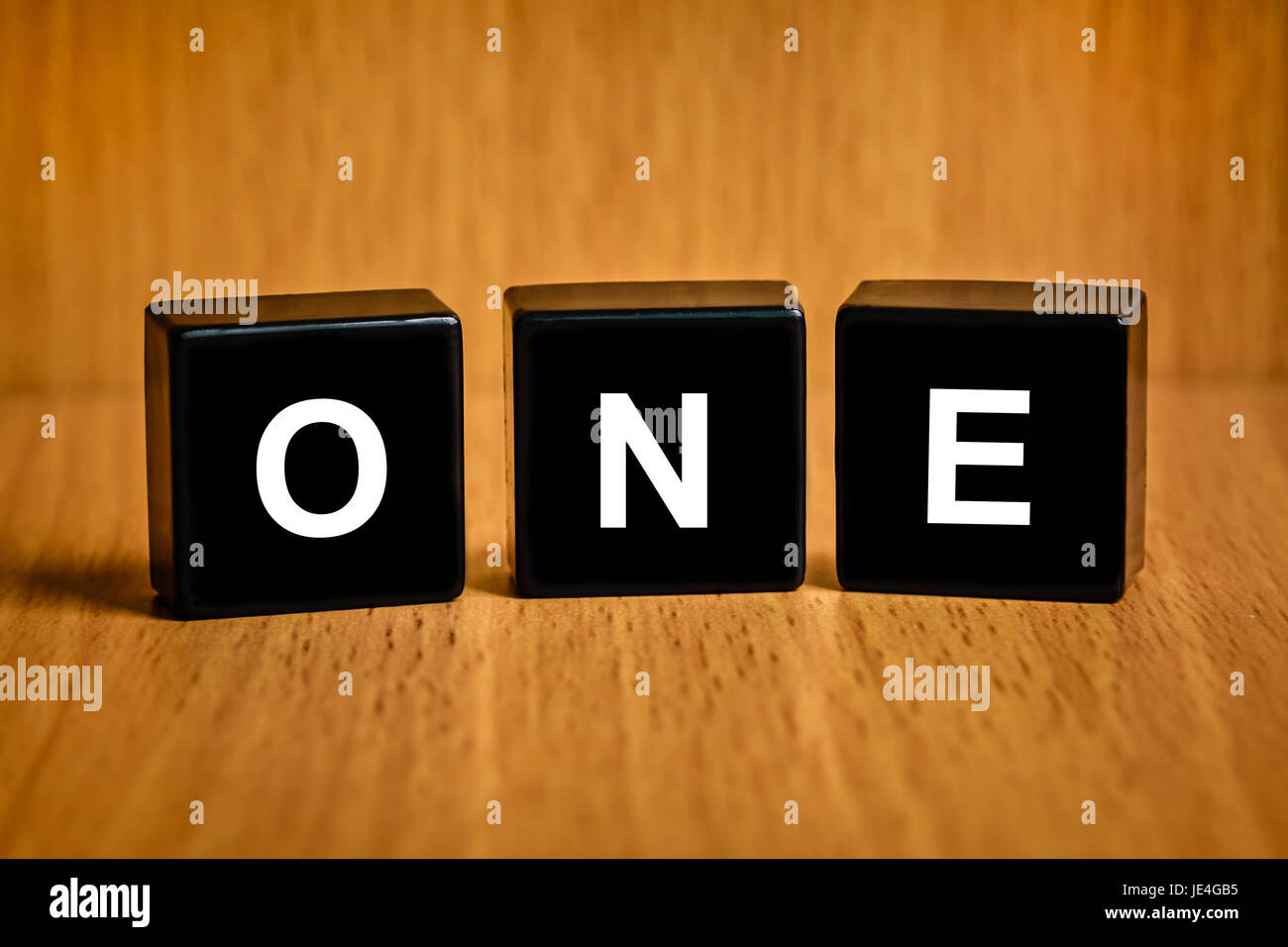 first, one text on black block Stock Photo - Alamy