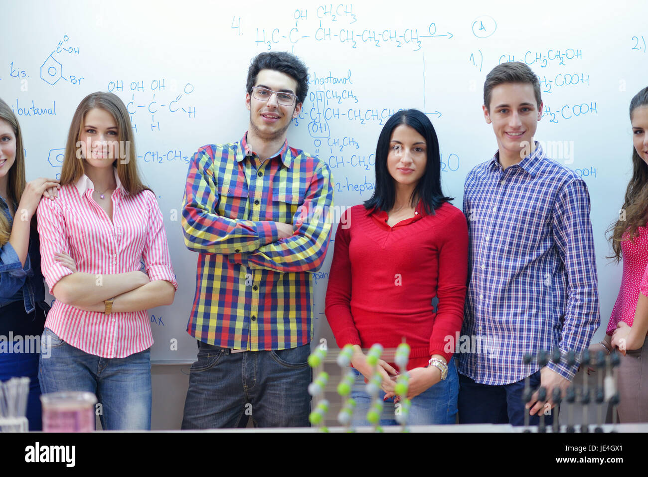 happy young teens group in school have fun an learning lessons Stock ...