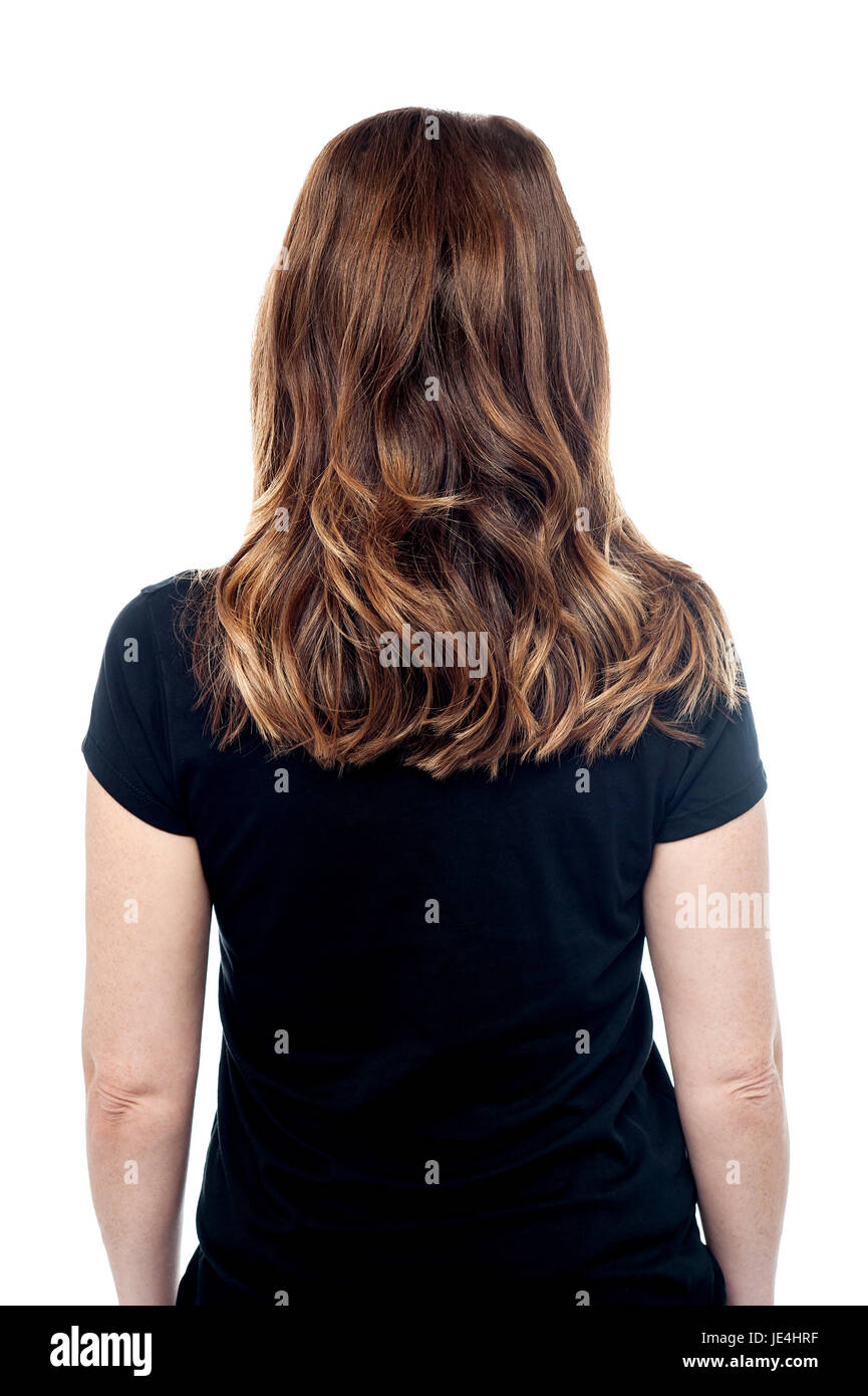 Back view of beautiful woman looks ahead Stock Photo - Alamy